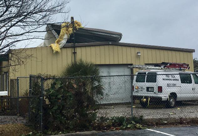 Storms dump water here, cause Destin damage | Holt Enterprise News